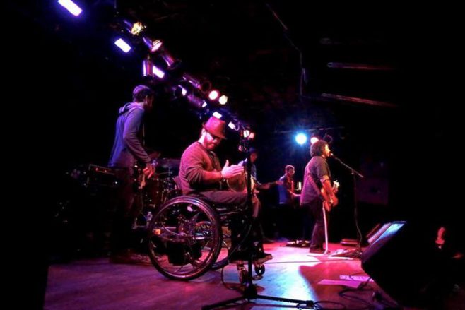 From Heavy Metal to Harps: Paraplegic George Flores Rocks as He Rolls ...